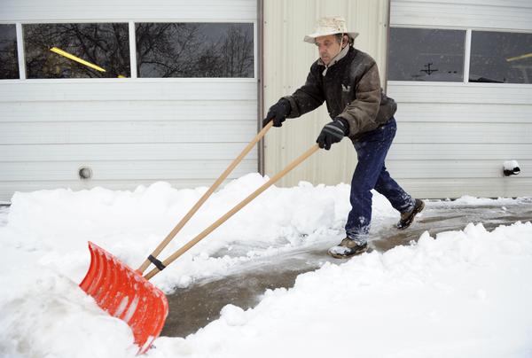 Round Table Project Management: Plowing Snow by hand