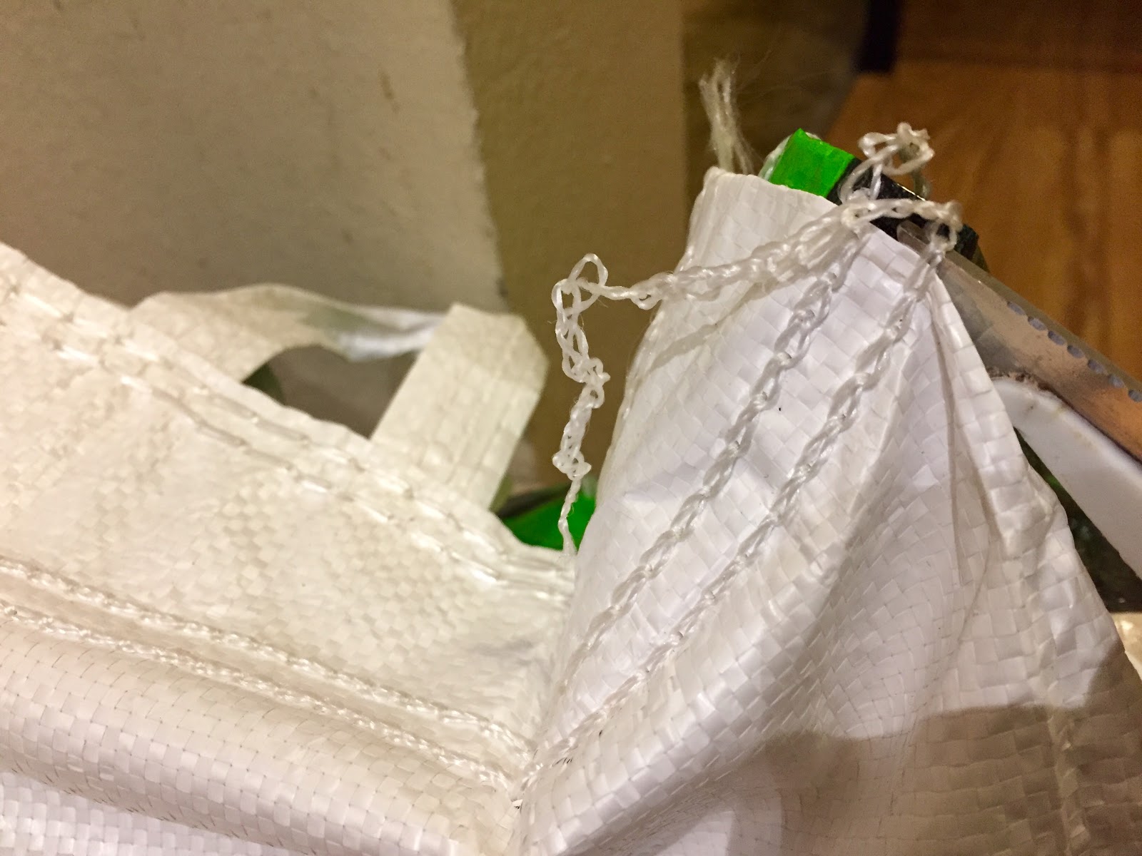 HOW TO OPEN A SEWN RICE SACK