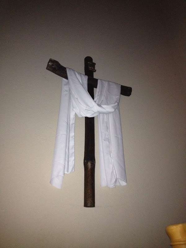 Cross With Cloth Draped Meaning