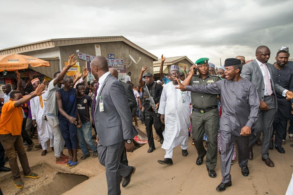 Photos/Video: Osinbajo visits Garki market in Abuja, meets and ...