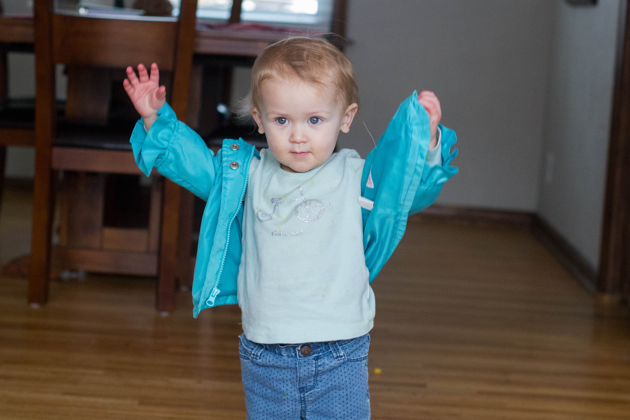 Child Putting On Jacket
