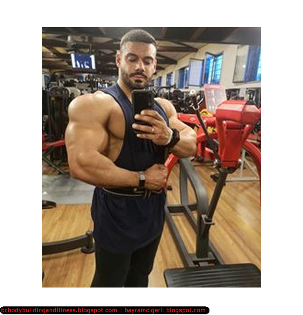 Fitness Model Simone Bestagno and His Big Muscle arms in sport black ...