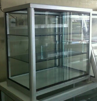 ETALASE ROKOK YOGYAKARTA - KUSEN ALUMINIUM KACA YOGYAKARTA