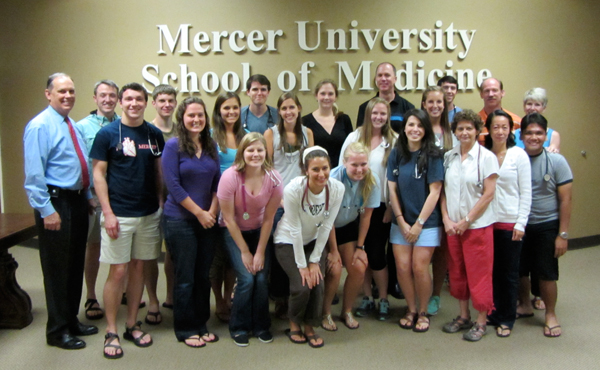 A flower in the dust: Mercer University Dean,Students and Faculty