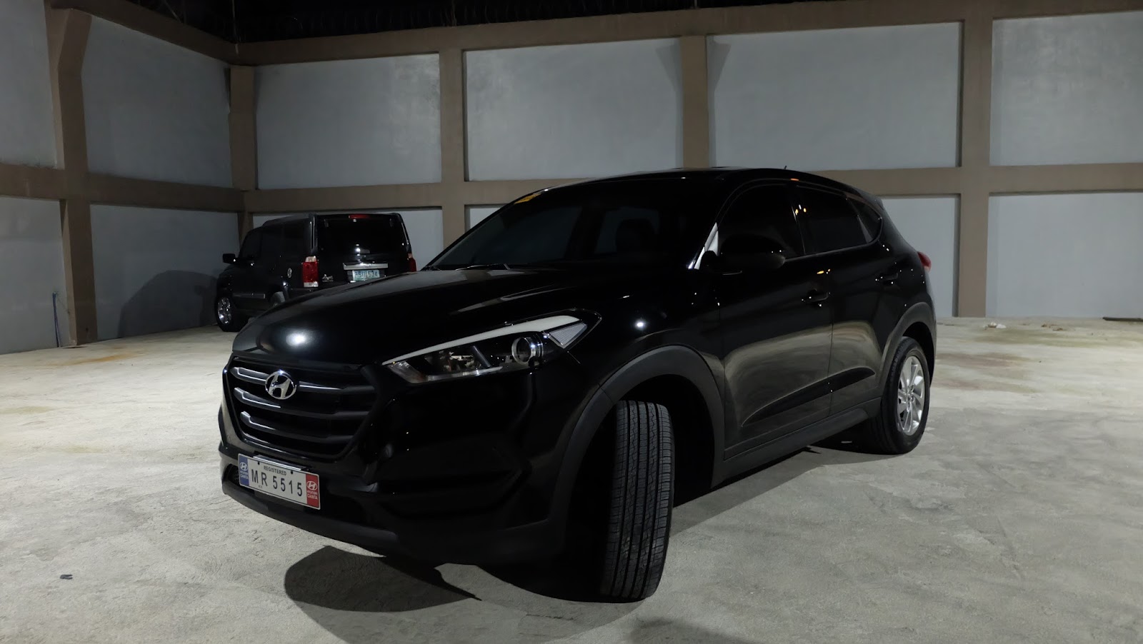 Road to stealthy look : Matte black vinyl wrap on Hyundai Tucson stock ...