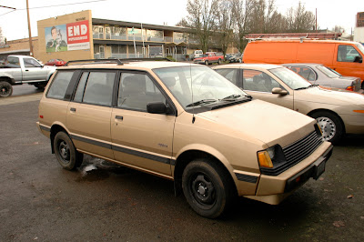 OLD PARKED CARS.: 1987 Colt Vista.