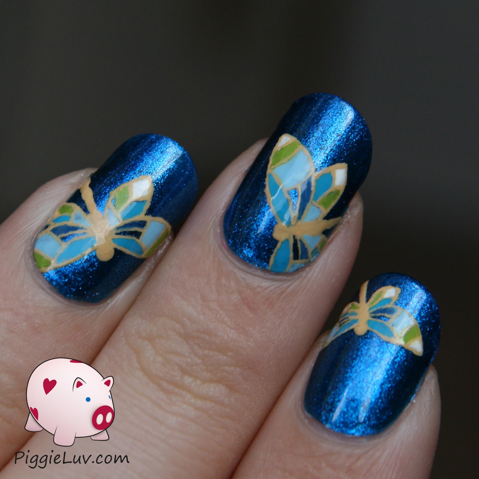 PiggieLuv: Blue dragonfly nails for Autism