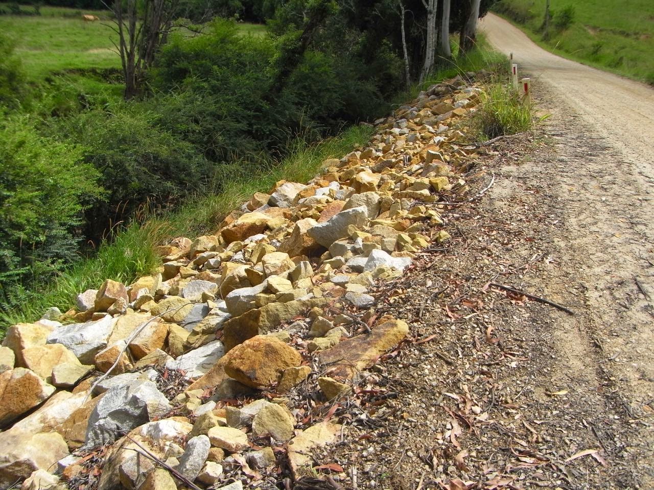 Bellingen/Bowraville road: Rock fills to repair dirt road section of ...