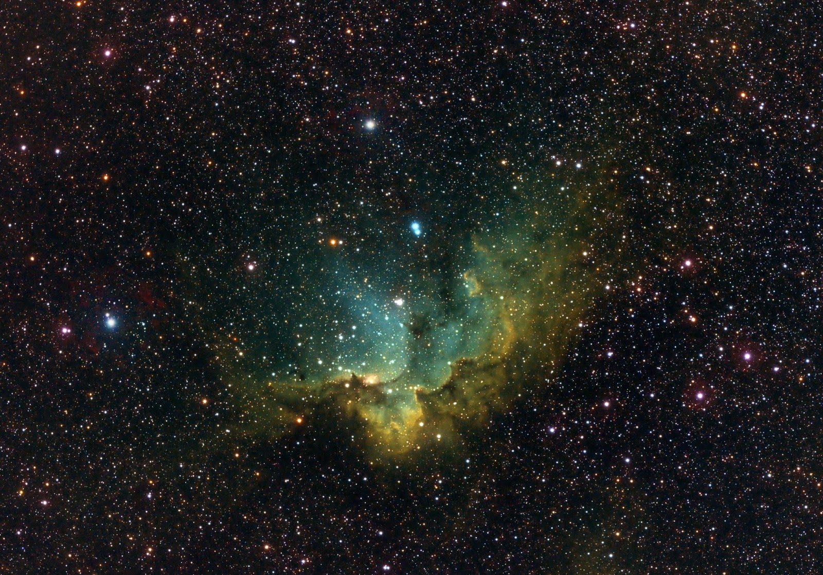 Sky and Rockets: The Wizard Nebula in SHO (The Hubble Palette)