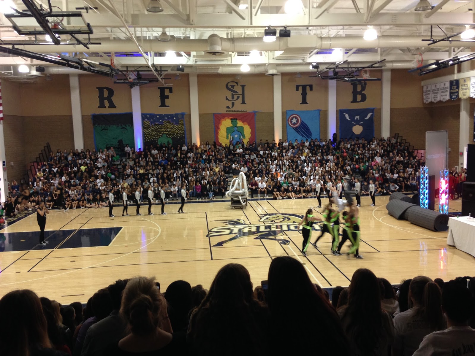 The Cinnamon Note: Superhero-themed Pep Rally