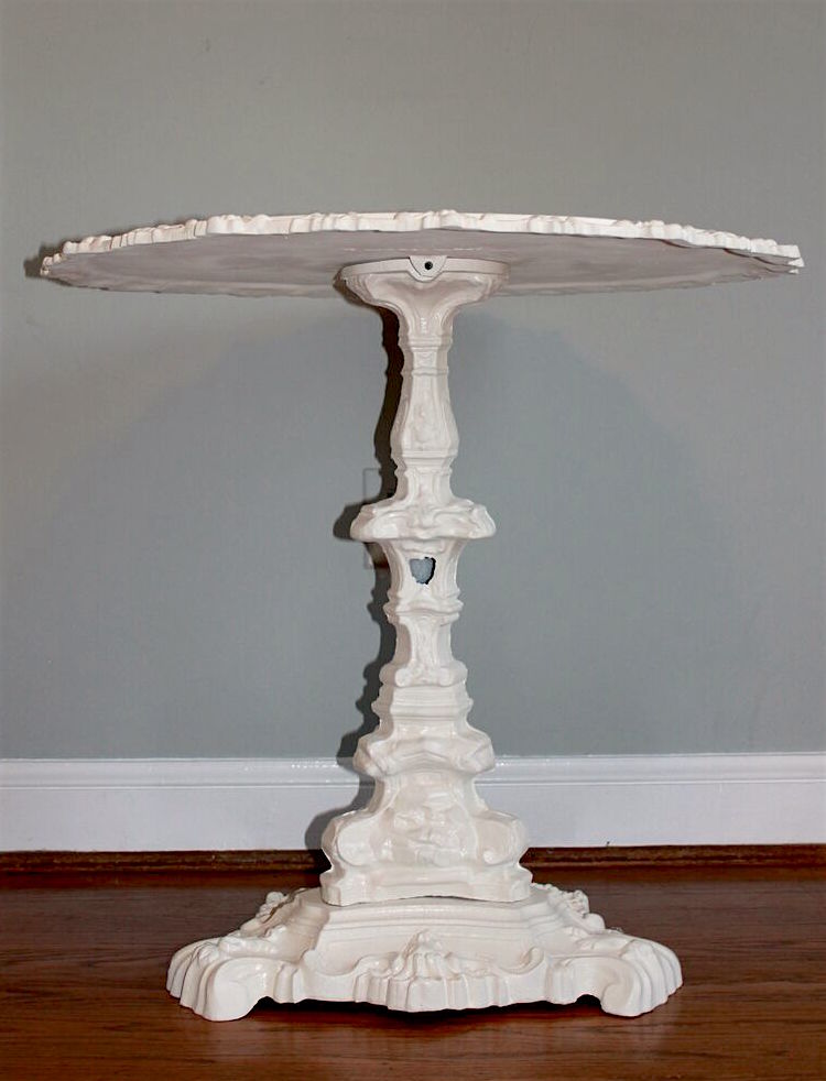 Honeywood Studio: A Rare Round Tilt Top Cast Iron Table