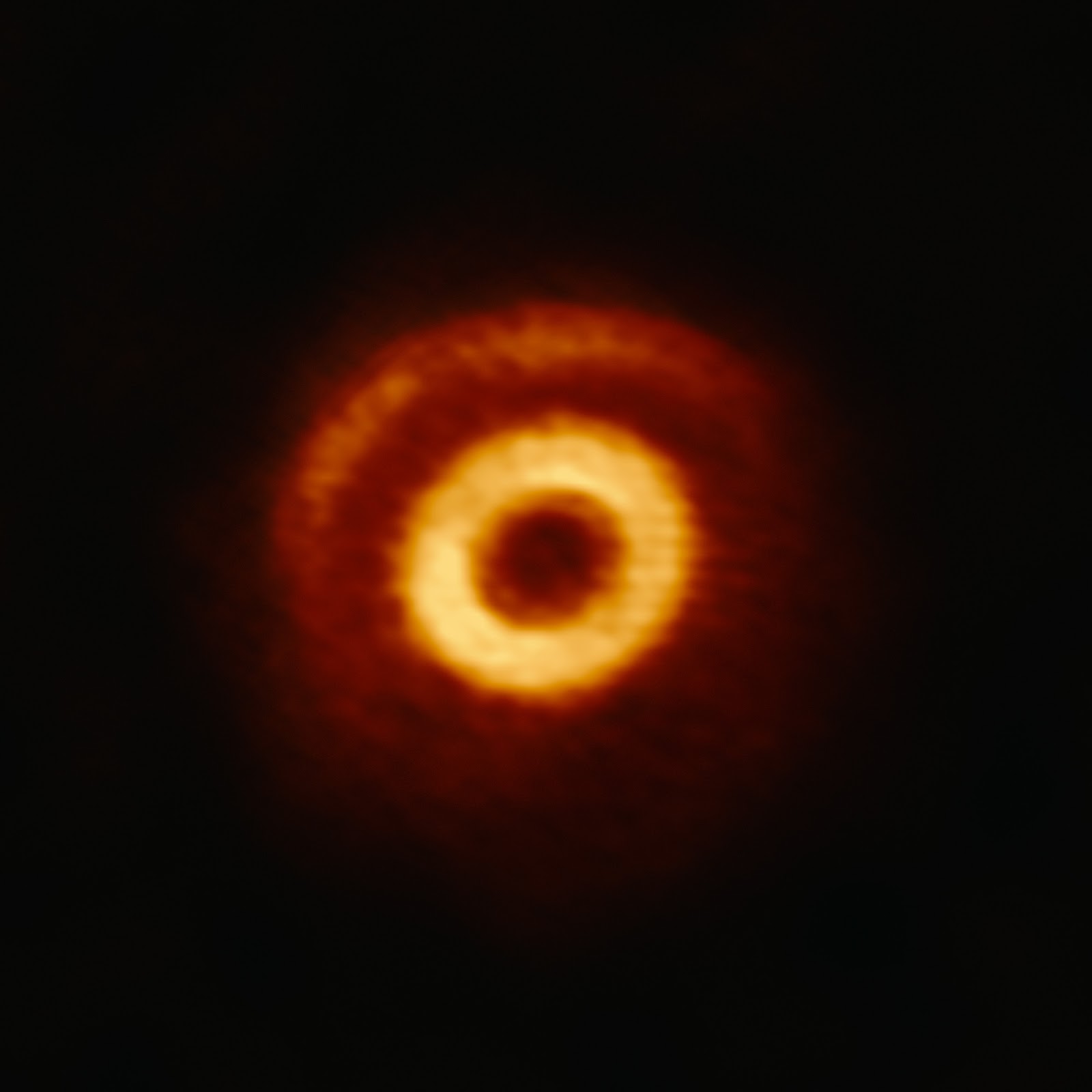 Protoplanetary Disk V1247 Orionis | Earth Blog