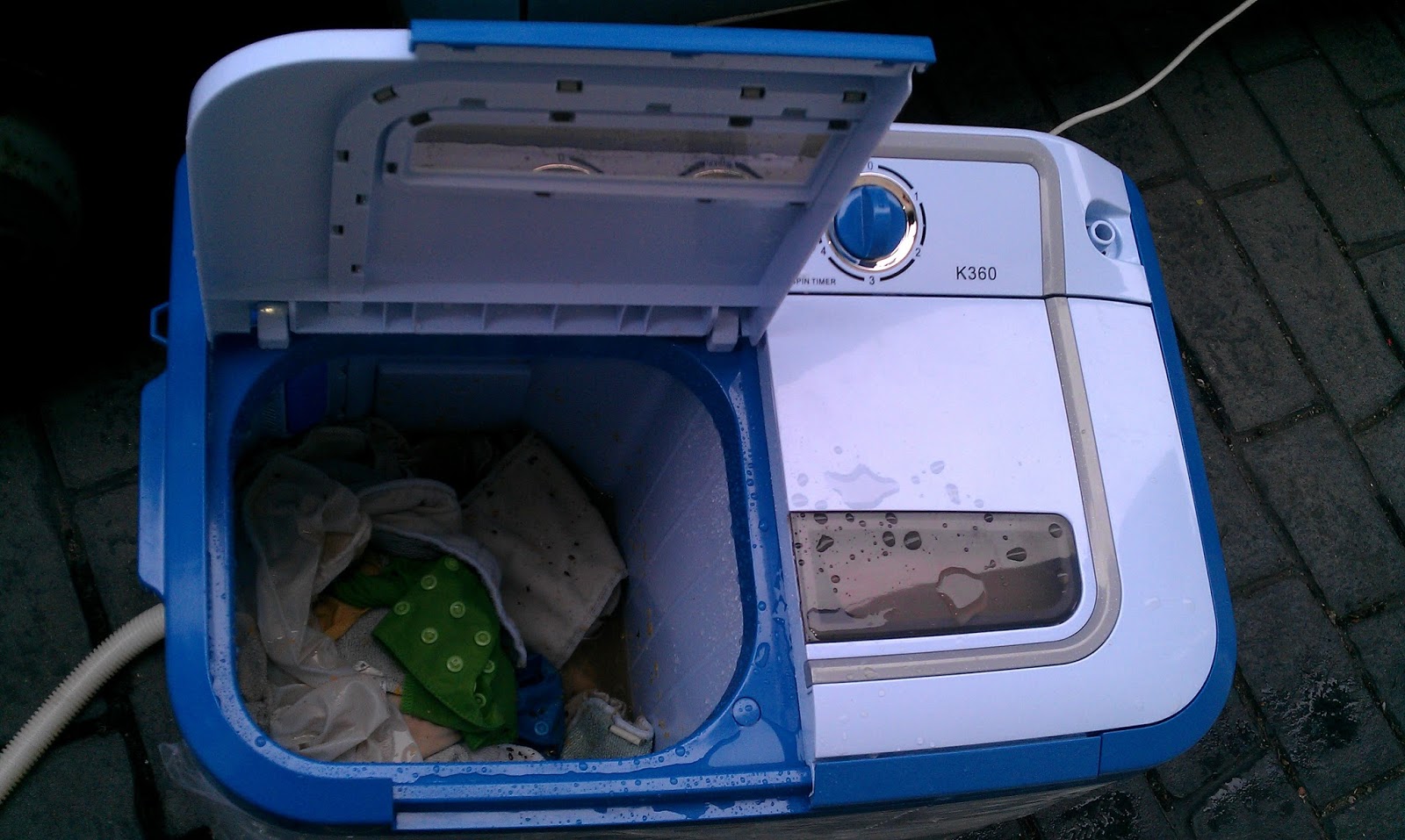 Coming Home: solar powered washing machine -cloth nappy face