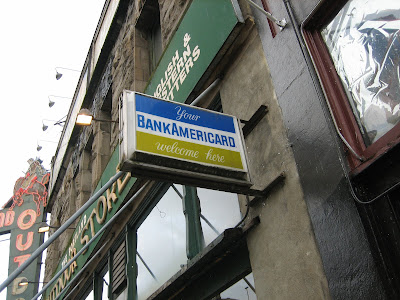 Modern Relics: Your BankAmericard Welcome Here lighted sign in Portland