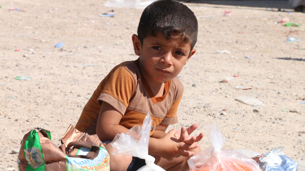575,000 Iraqi children are estimated to be at work instead of school