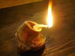 La historia de la iluminación.: EL PRIMER CANDIL