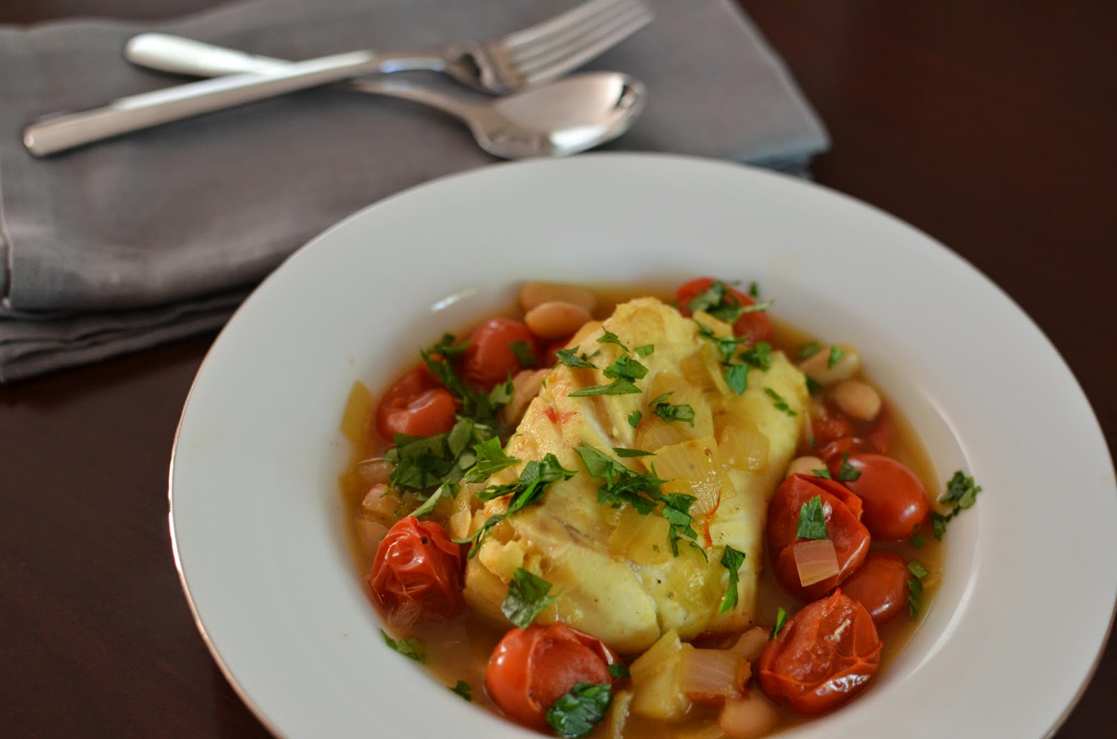 Playing with Flour: Poached saffron cod with burst tomatoes and white beans