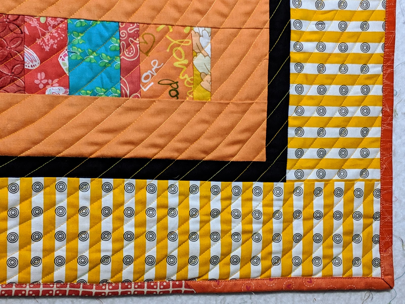 Fret Not Yourself: Chinese Coins with Spirals Quilt