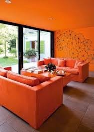 Salas decoradas en naranja - Colores en Casa
