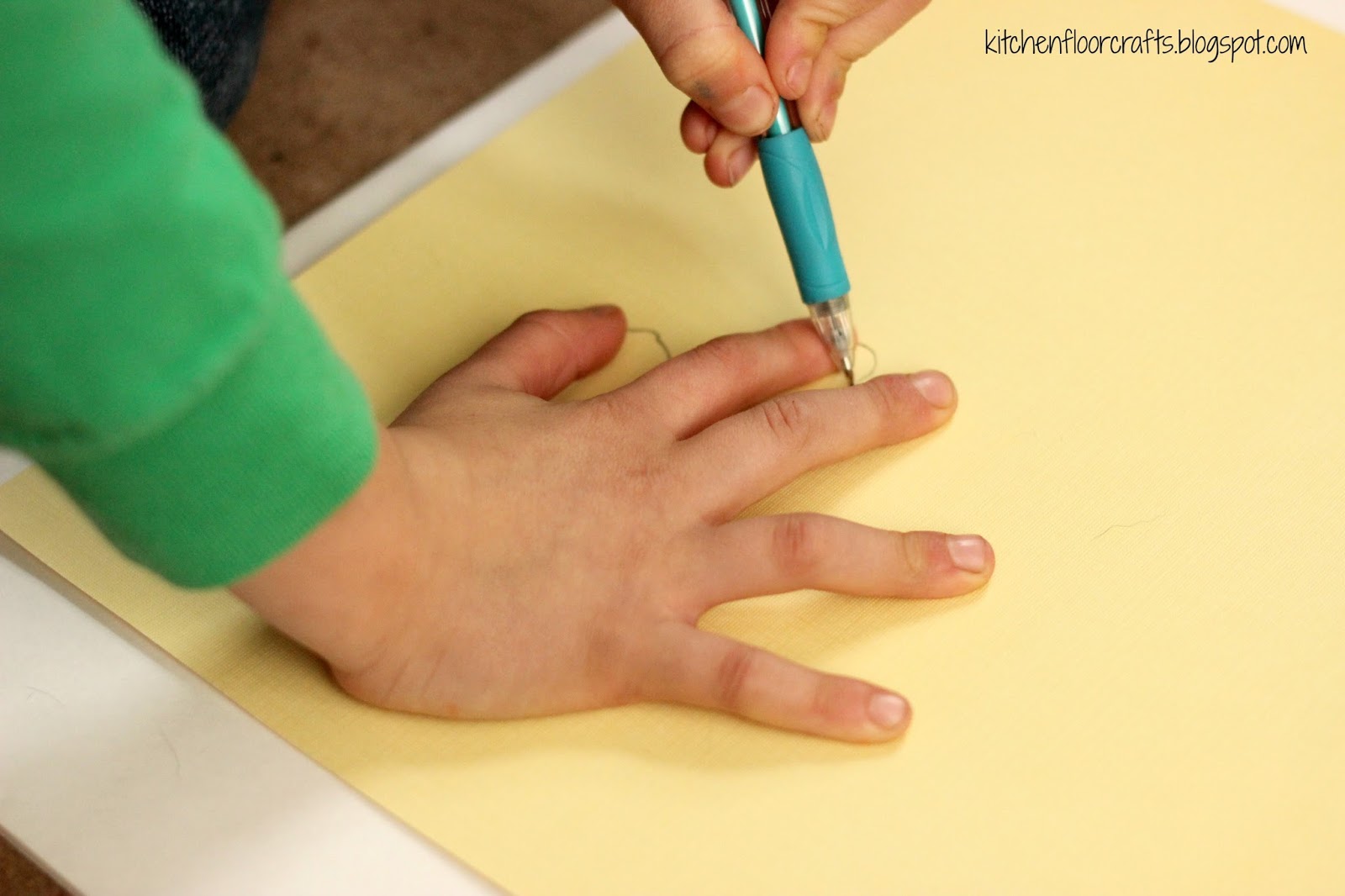 Kitchen Floor Crafts: "Shades of People" Handprint Wreath
