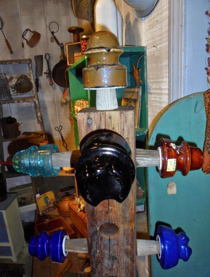Log Cabin Antiques & Gifts: Very cool insulator display stand