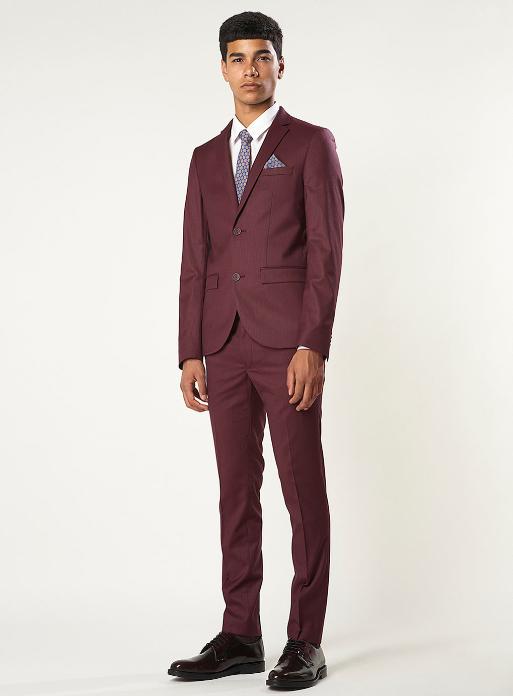 Tommyrot.: A Suit of a Different Color....