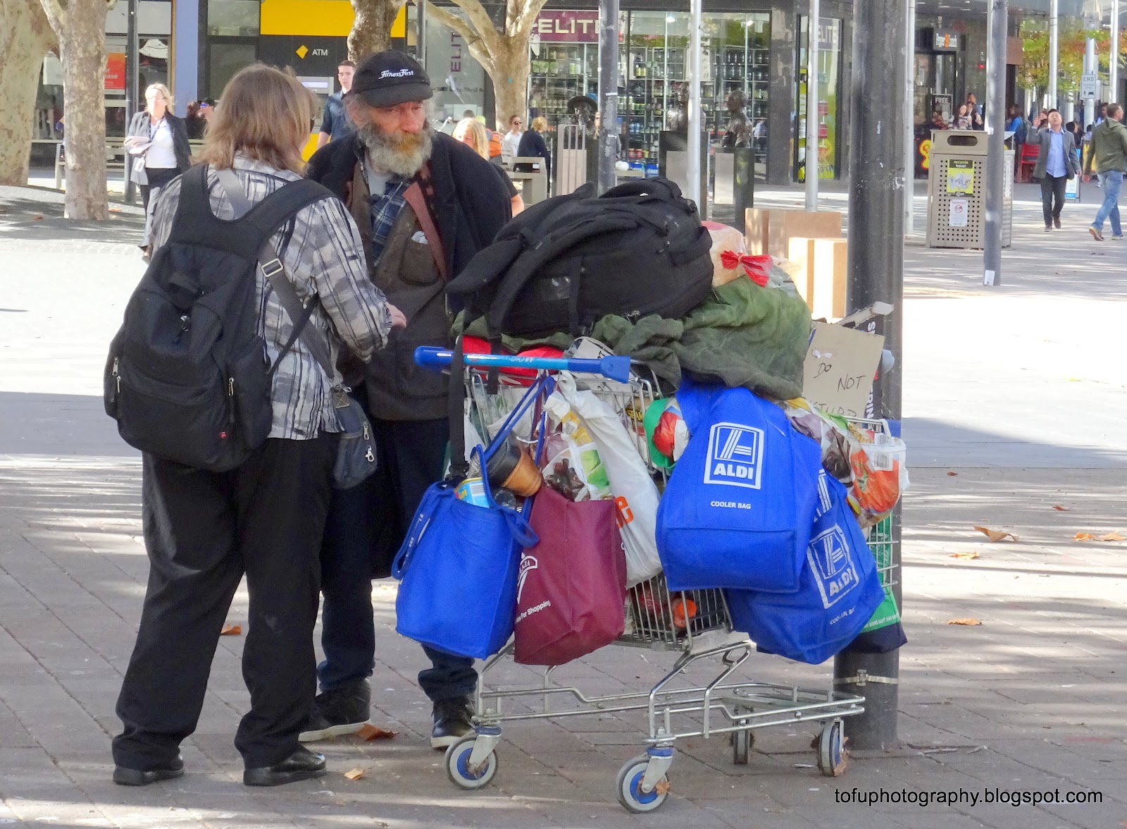 Tofu Photography: Homeless man with his worldly possessions in a ...