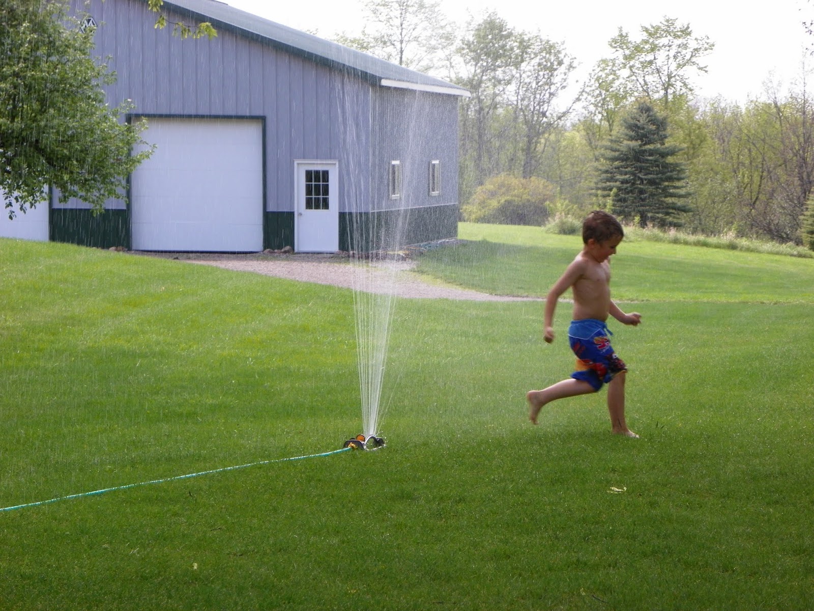 A Simple Stay At Home Mom: Sprinkler fun in May