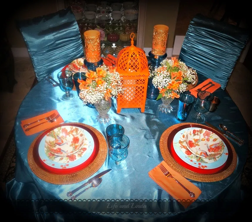 A Sea of Blue Green with Orange Table | Life and Linda