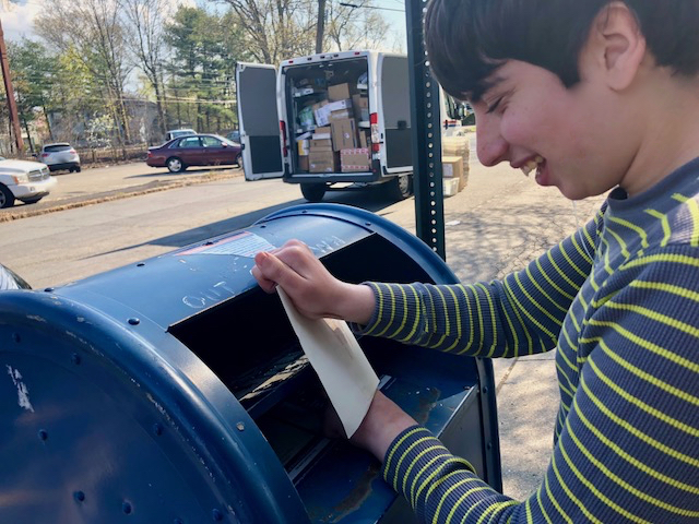 Love That Max : The other boy practicing mailing a letter