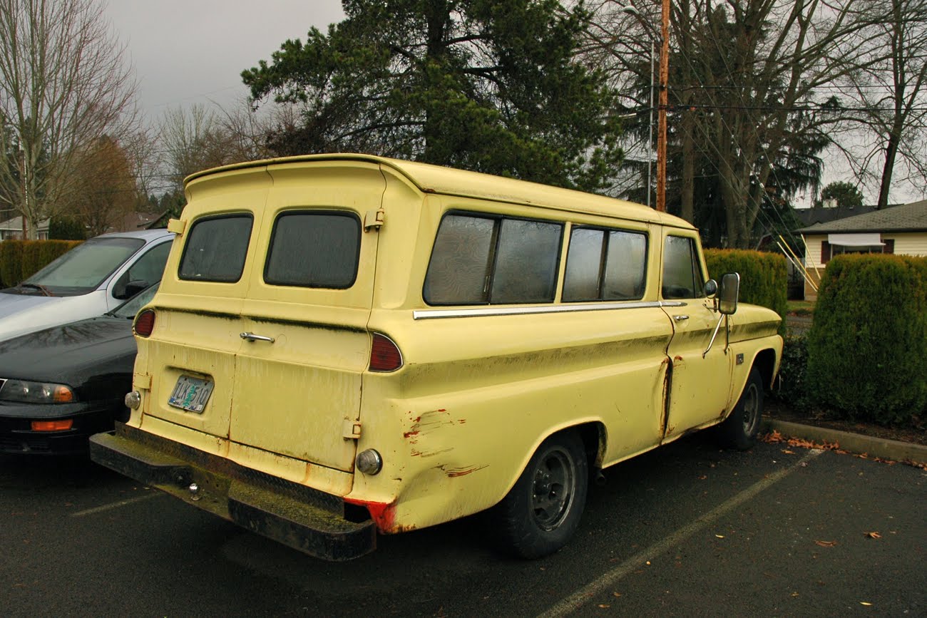 OLD PARKED CARS.: 1965 Chevrolet Suburban.