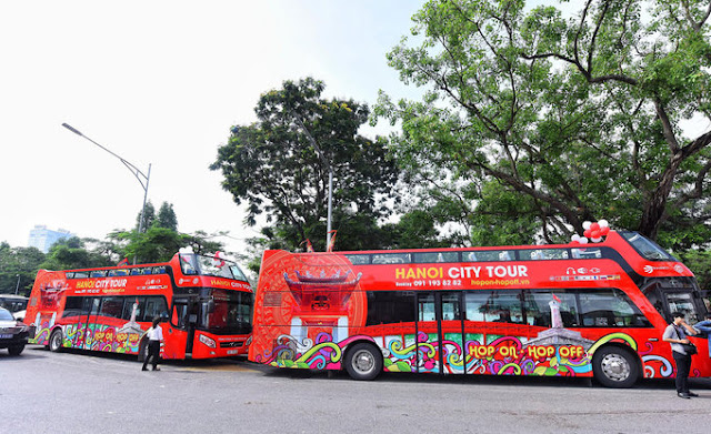 Passengers experience the first double decker bus in Hanoi