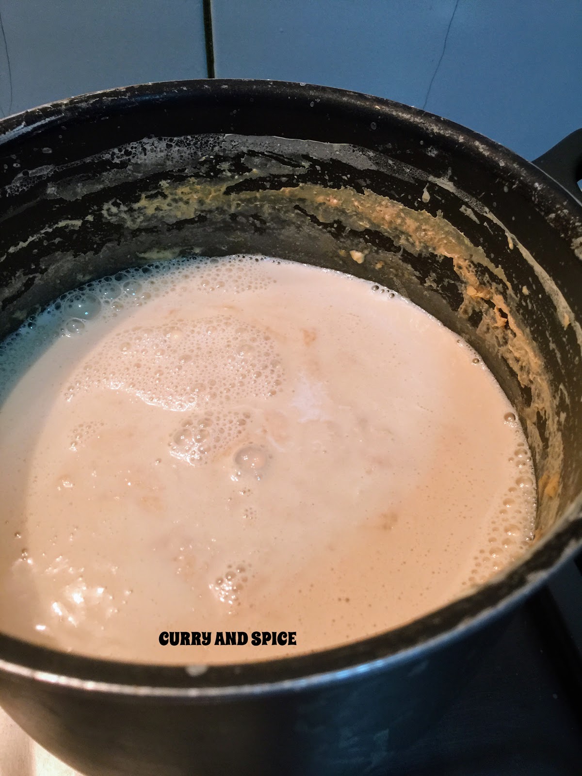 CURRY AND SPICE: KAJU KISHMISH BHORA SUJI NARKOL ER NARU