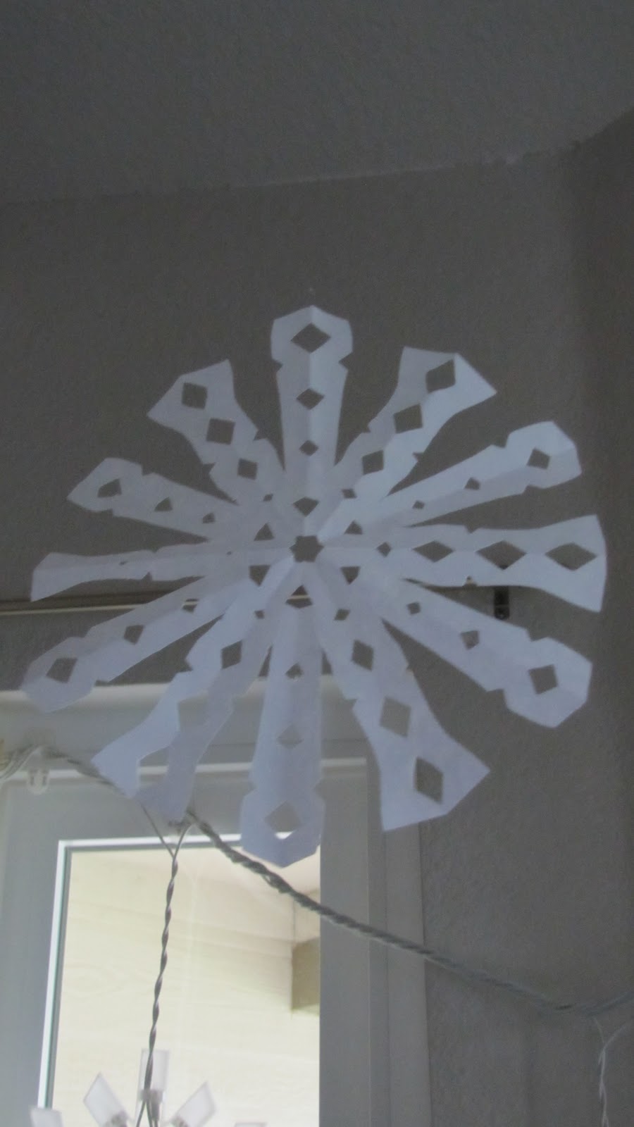Adventures in DIY: Paper Snowflakes: Pinterest Addiction #3