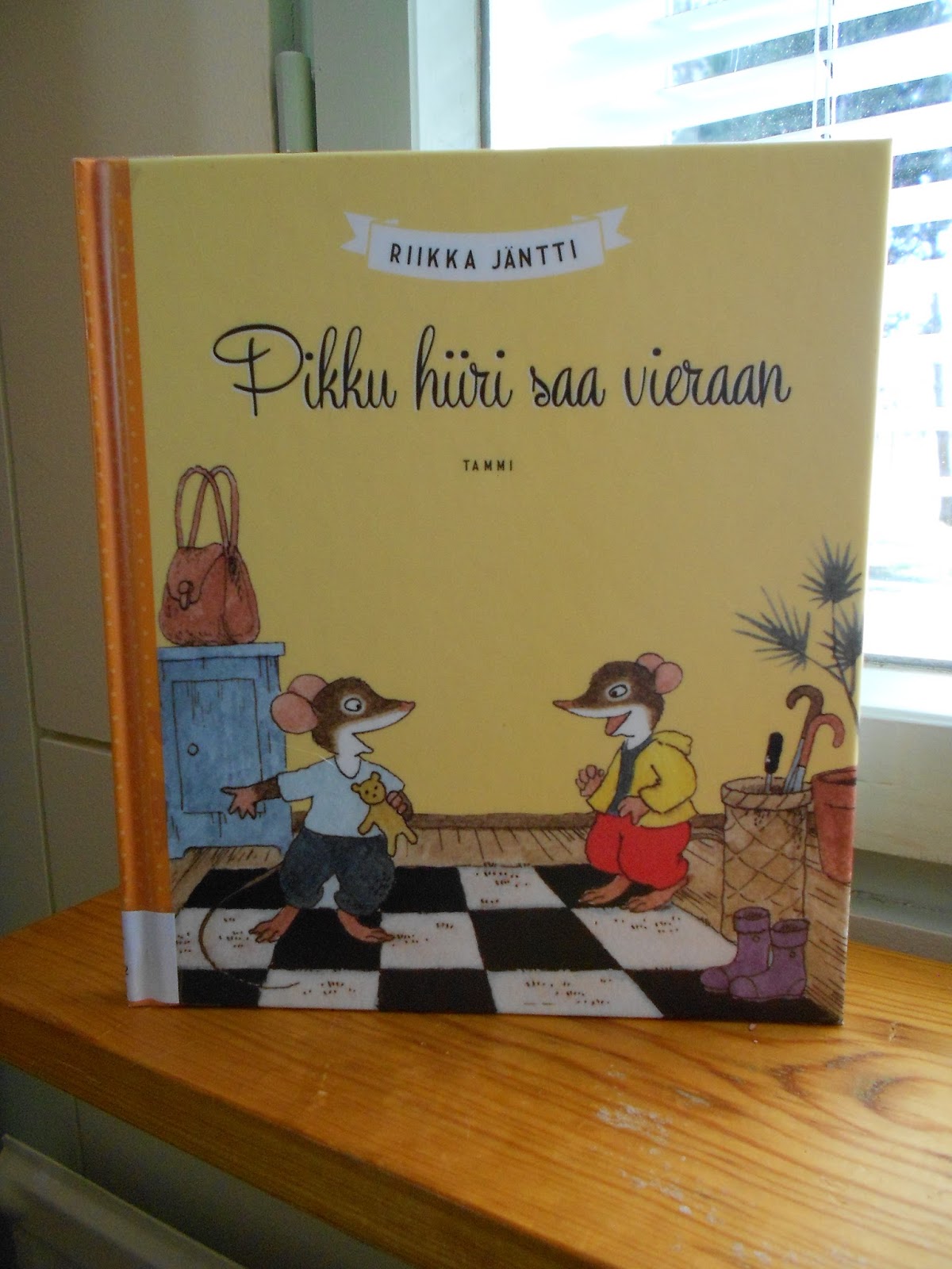 Kirjakaapin avain: Pikku hiiri saa vieraan