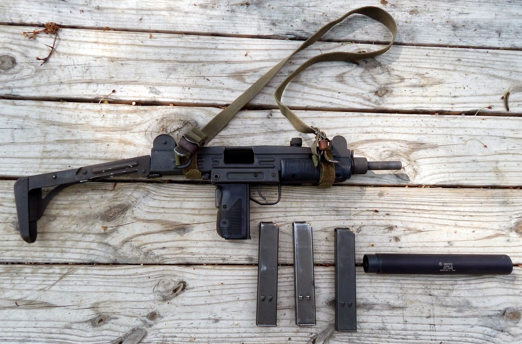 Lagniappe's Lair: Uzi with suppressor. Fun AND frustrating.