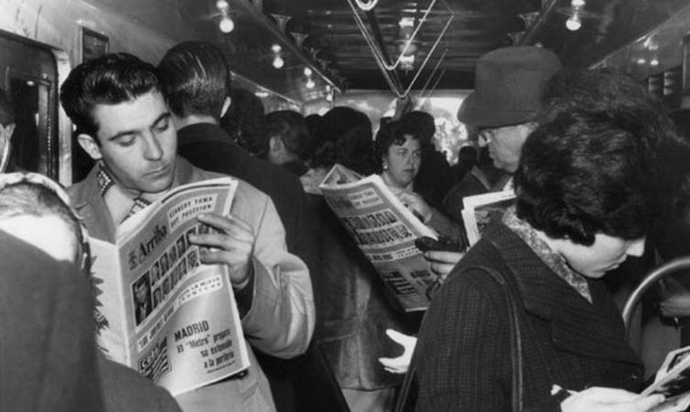Young People Reading Newspapers