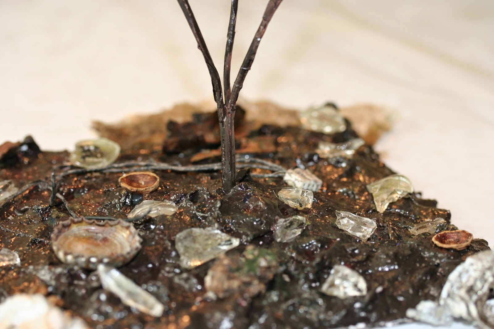 Silver Bells and Cockle Shells: Modroc sculpture of dying flower