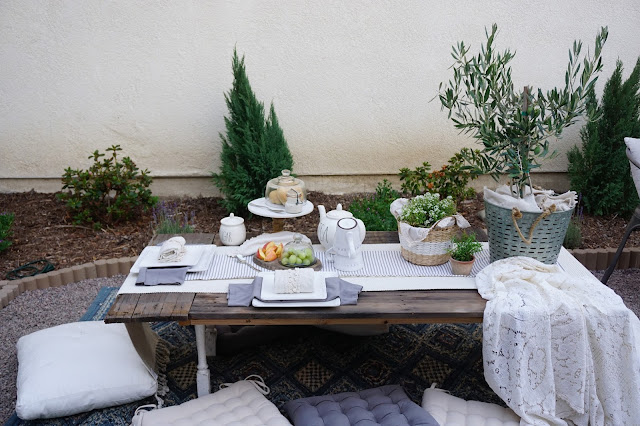 I added my olive tree that is growing pretty well on the patio along ...