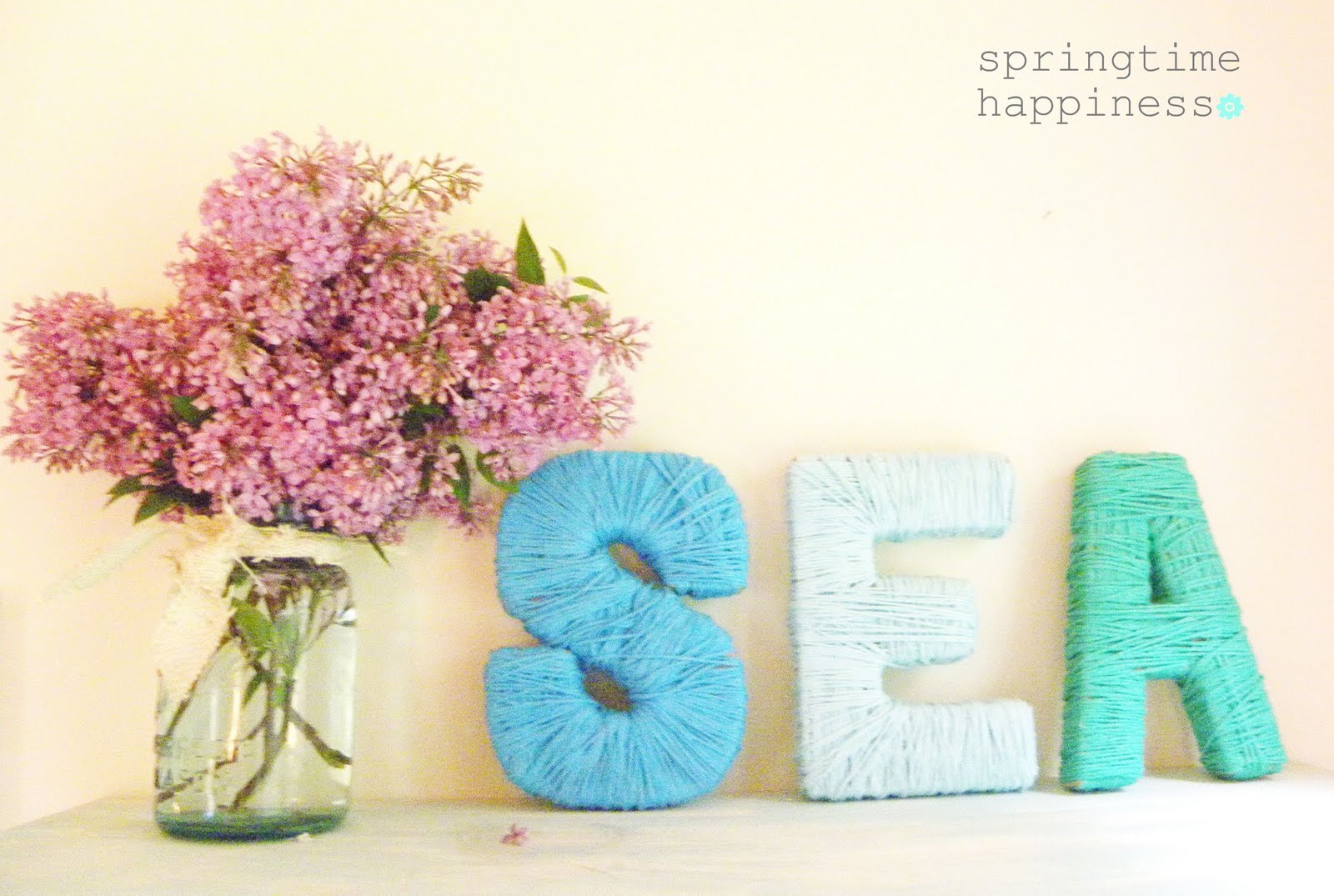 Simple Daisy: {yarn wrapped letters}