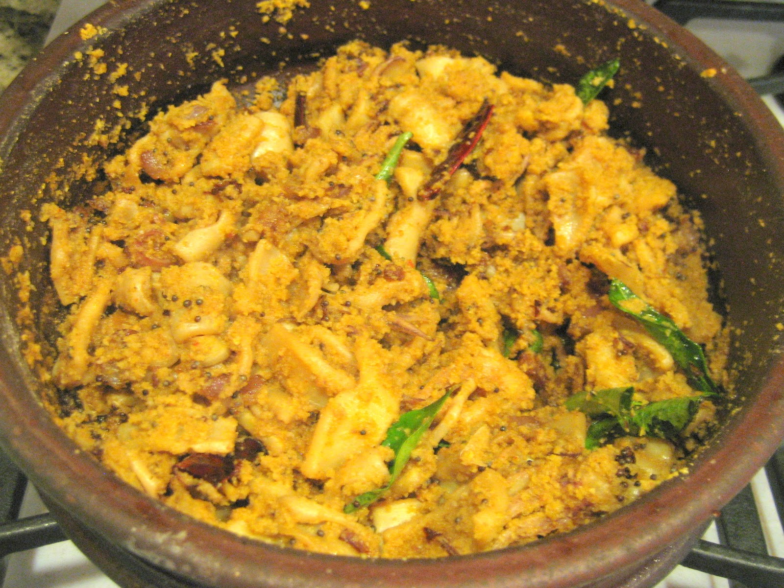 Food my companion: Squid sauteed in spicy grated coconut (Kanava thoran)
