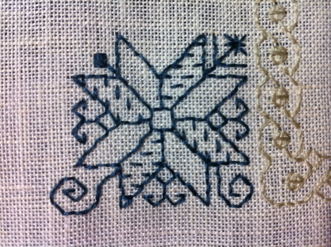Loara Standish Sampler: Band 17 left side Step 3 Blue Motif on the right