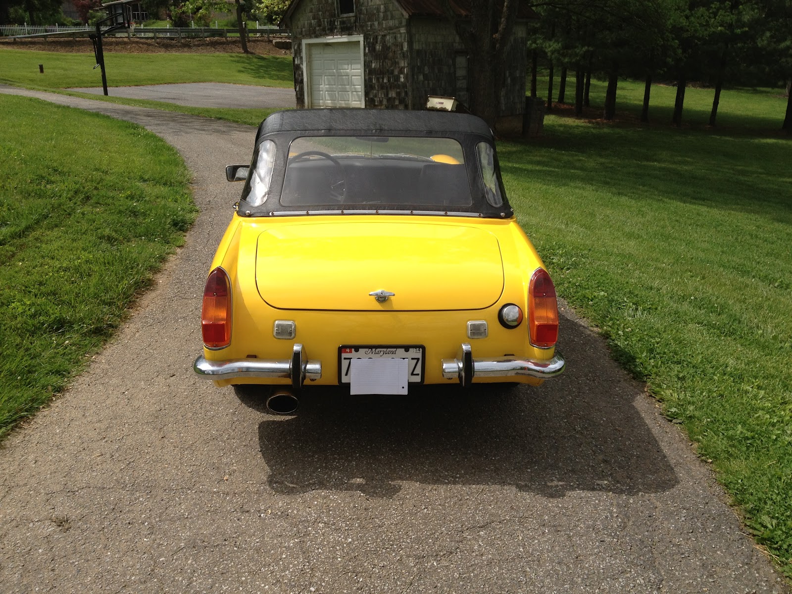 Yellow MG Midget