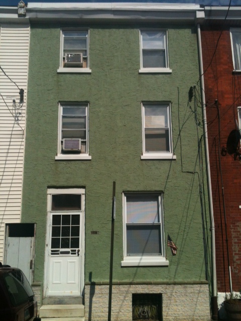 designer in exile: The Tiny House of the Father, Son, and Holy Ghost