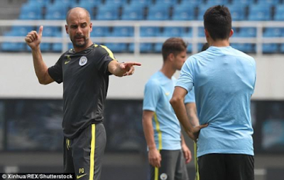 Pep Guardiola bans Man City players from eating pizza & banishes ...