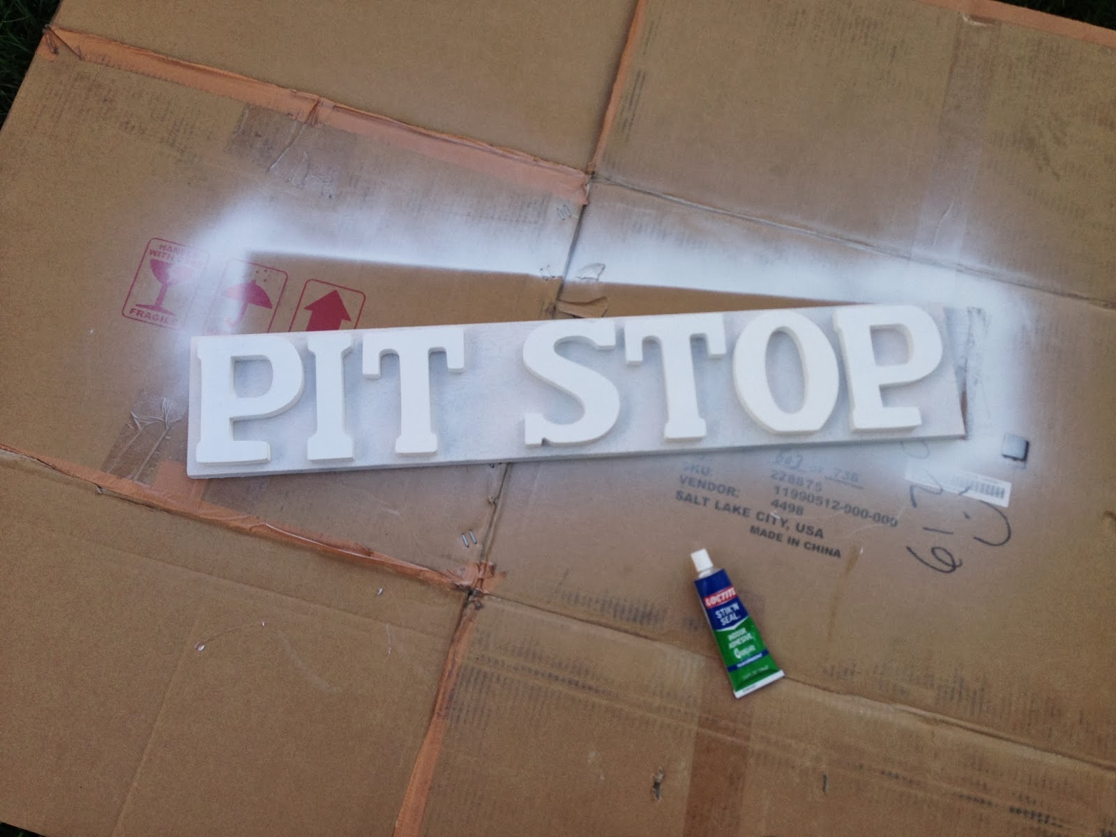 design dump: diy "pit stop" bathroom sign