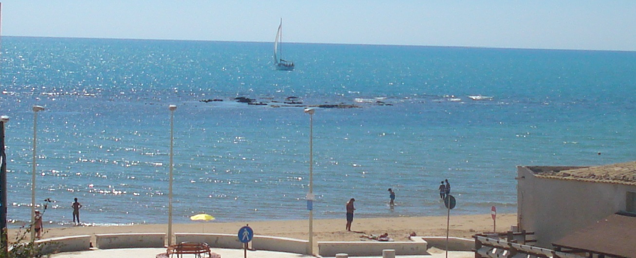 Ragusa turismo: Isola dei Gabbiani in Punta Secca prima del temporale