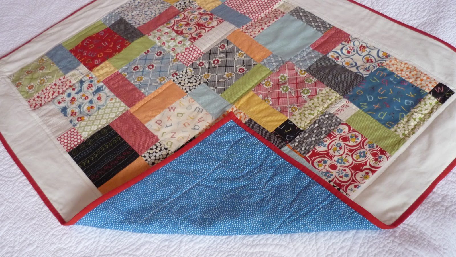 Mown: Disappearing Nine Patch Baby Quilt
