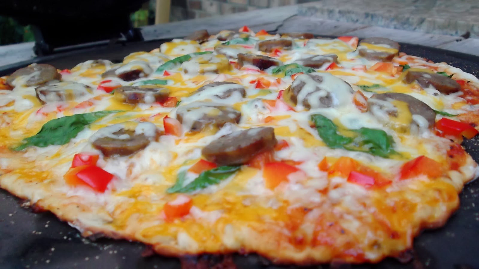 Lowcountry Smoke: Sausage, Basil, and Red Sweet Pepper Pizza