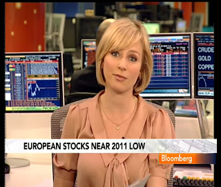 Ladies in Satin Blouses: various Bloomberg TV anchors in satin blouses